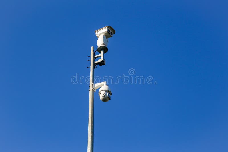 Rotating Security Camera and Double Lens Security Camera on Street Pole ...