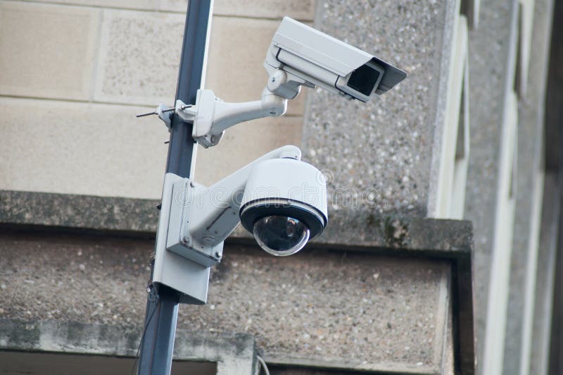 White Security Camera of Security on Urban Background Stock Photo ...