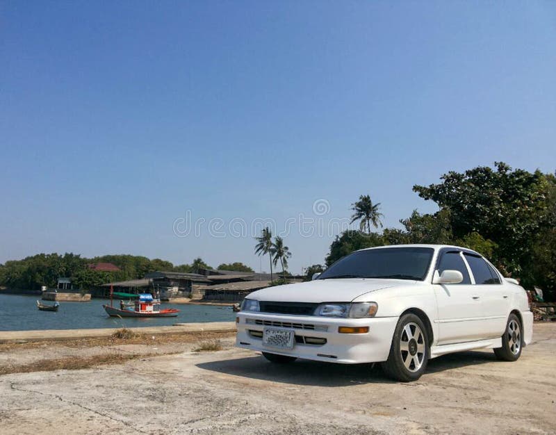 A white sedan - rear stock image. Image of vehicle, beach - 228606289