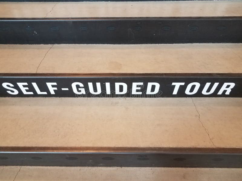 White Self Guided Tour Sign on Black and Grey Cement Stairs Stock Image ...