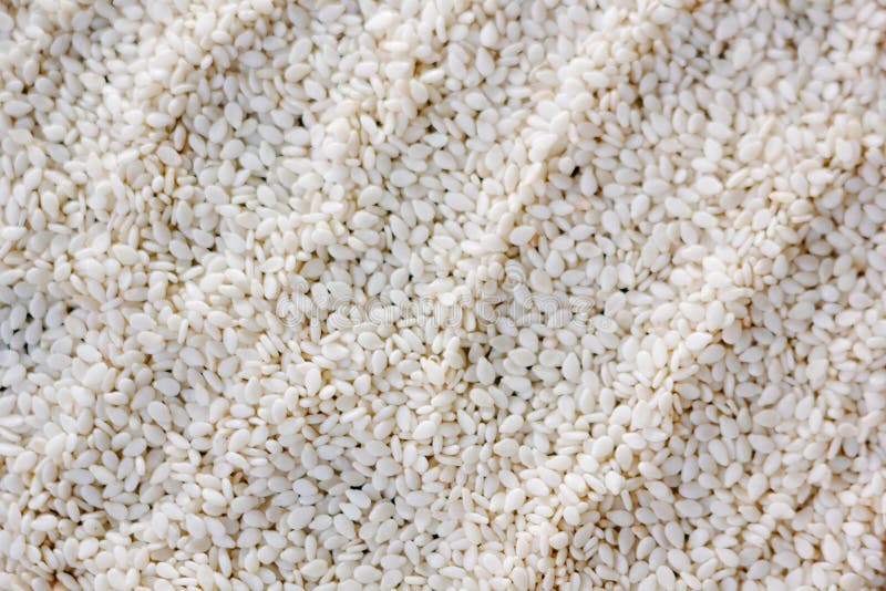 White sesame seeds texture stock image. Image of condiment - 82087351