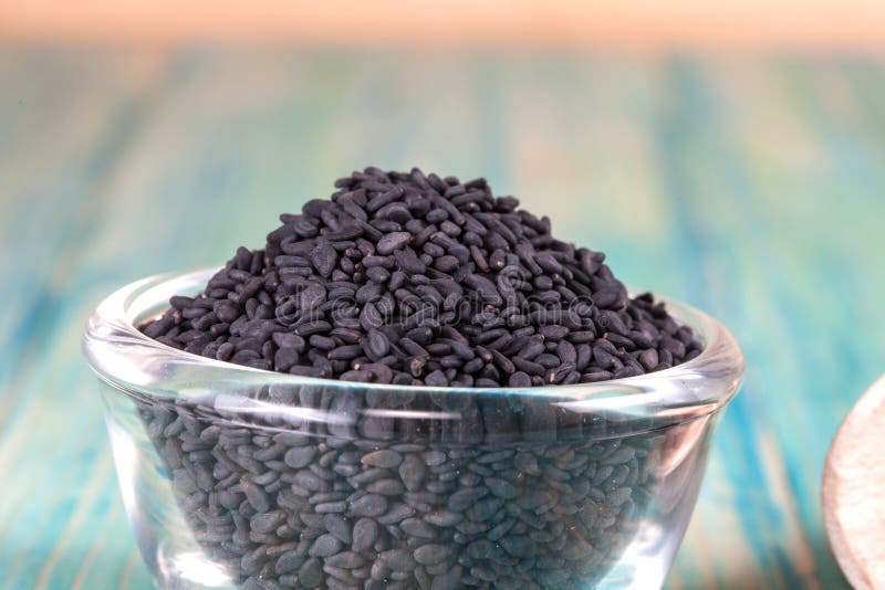 Sesame in Wood Bowl Isolated on White Stock Image - Image of black ...