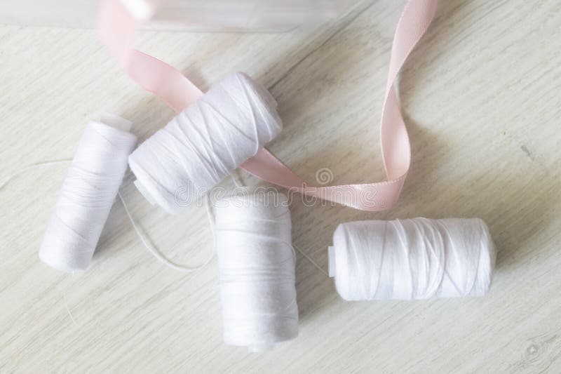 White Sewing Threads. White Background Stock Photo - Image of ...