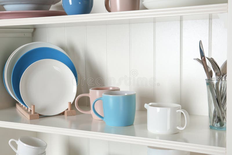 White Shelving with Set of Dishware Stock Image - Image of kitchen ...
