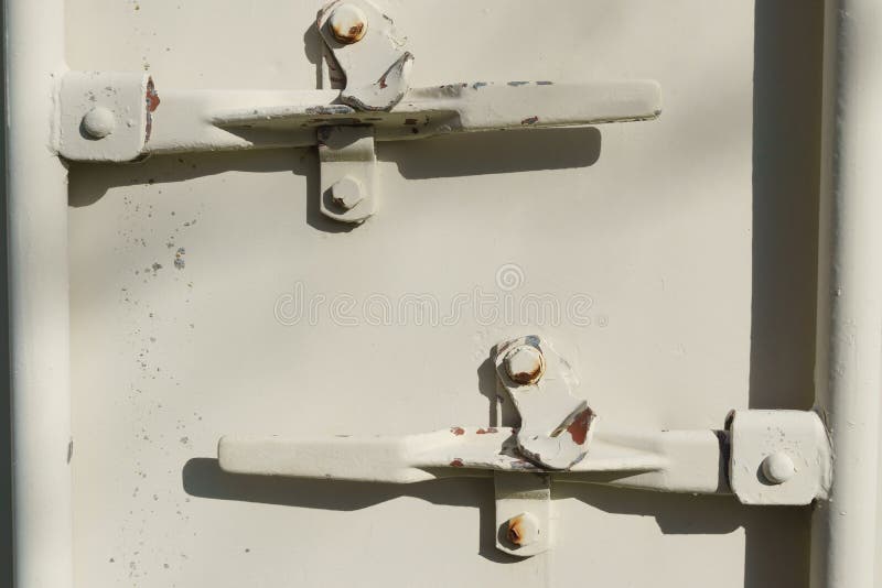White Shipping Container Door Latches Stock Photo - Image of battered ...