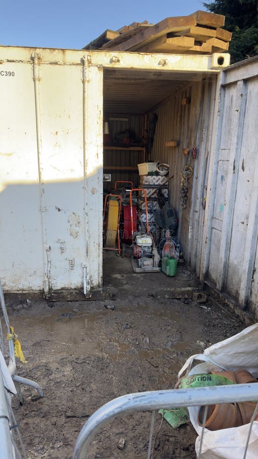 Shipping Container with Construction Equipment and Materials Editorial ...