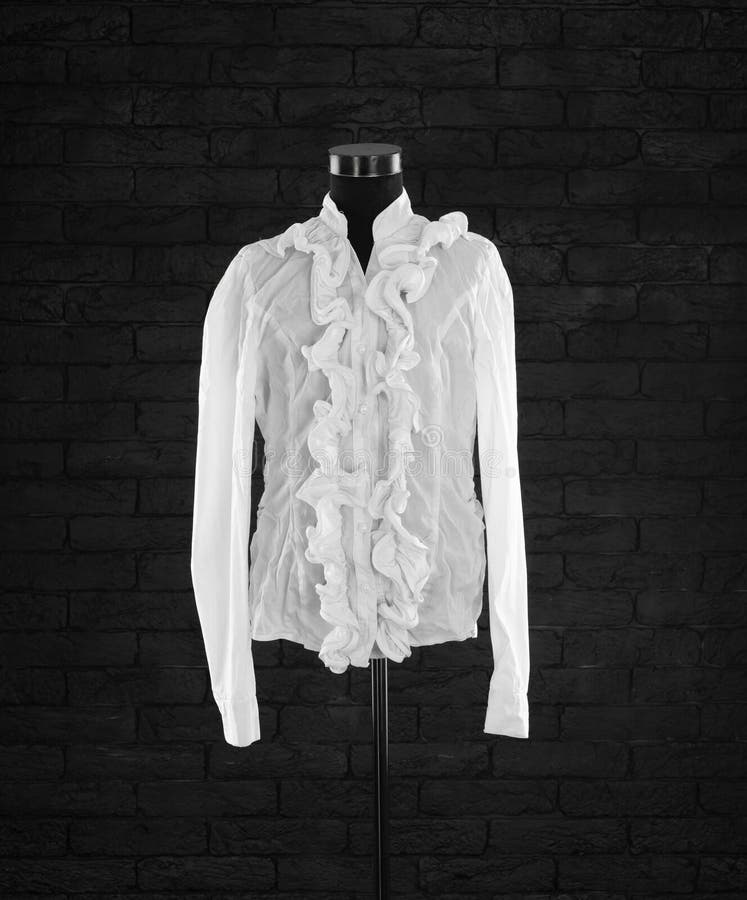 White shirt with ruffles stock photo. Image of sleeve - 289425996