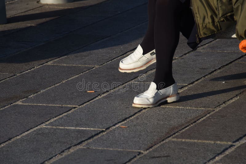 White Shoe Worn by a Woman on Black Hose. Stock Image - Image of shoe ...