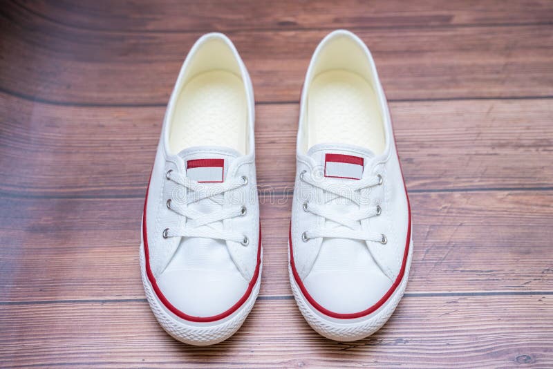 White Shoes and Red Stripe Fashion Sneaker Stock Photo - Image of foot ...