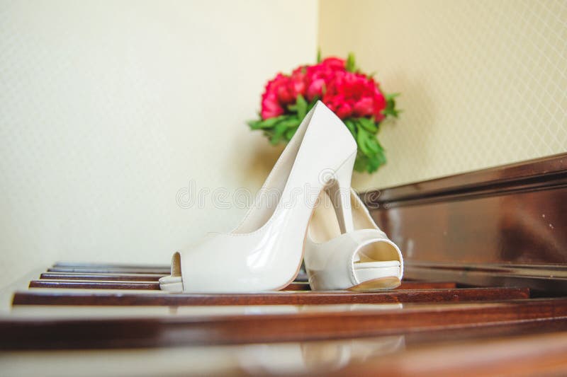 White Shoes on Wooden Table Stock Photo - Image of beauty, luxury: 69336034