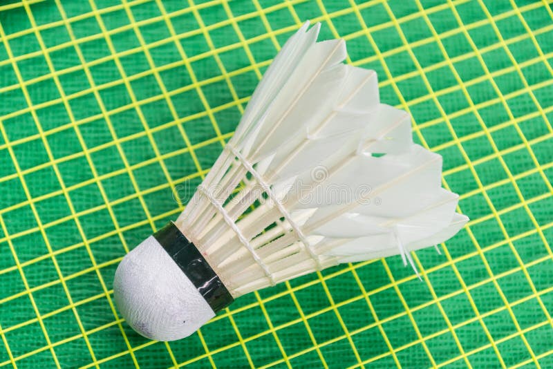 White Shuttlecock on Yellow Racket Net Stock Image - Image of active ...