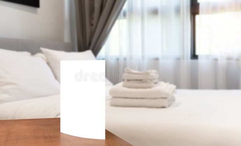 White Sign Cardboard with Copy Space on a White Round Table. Hotel ...