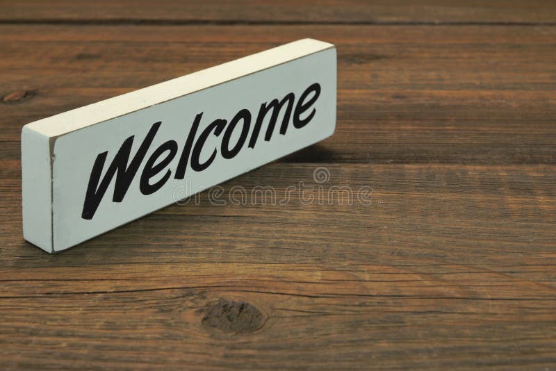 White Sign Welcome on the Rough Wood Table, Close Up Stock Image ...