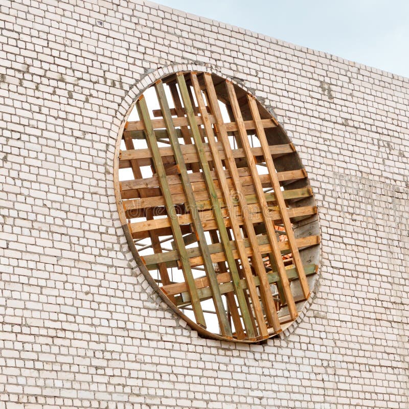 White Silicate Brick Wall and Wooden Formwork for Round Window Stock ...