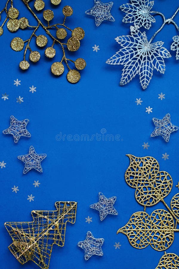 Ornate Christmas Decorations Frame on Classic Blue Color Background ...