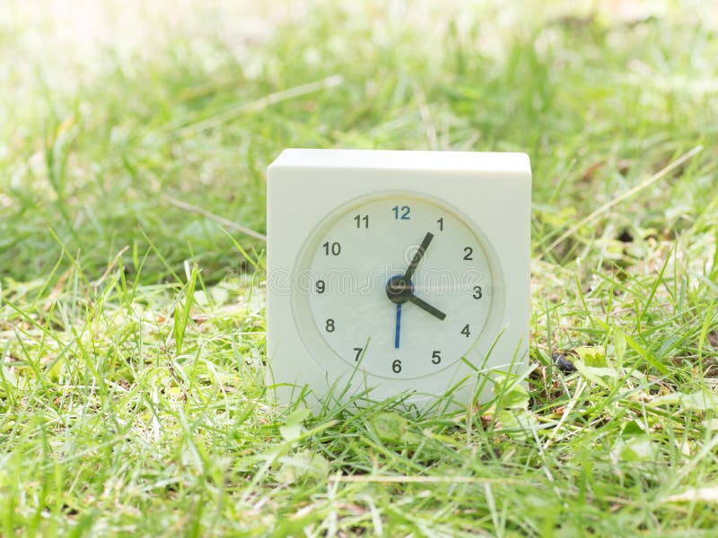 White Simple Clock on Lawn Yard, 4:05 Four Five Stock Photo - Image of ...