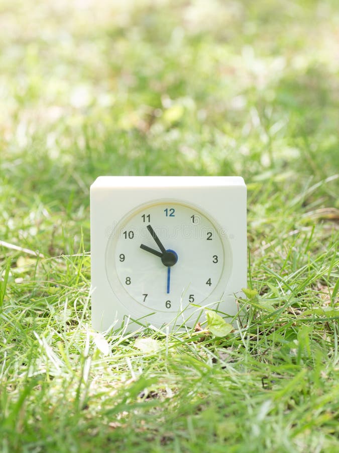 White Simple Clock on Lawn Yard, 9:55 Nine Fifty Five Stock Image ...