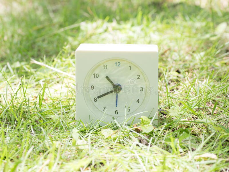 White Simple Clock on Lawn Yard, 10:40 Ten Forty Stock Image - Image of ...