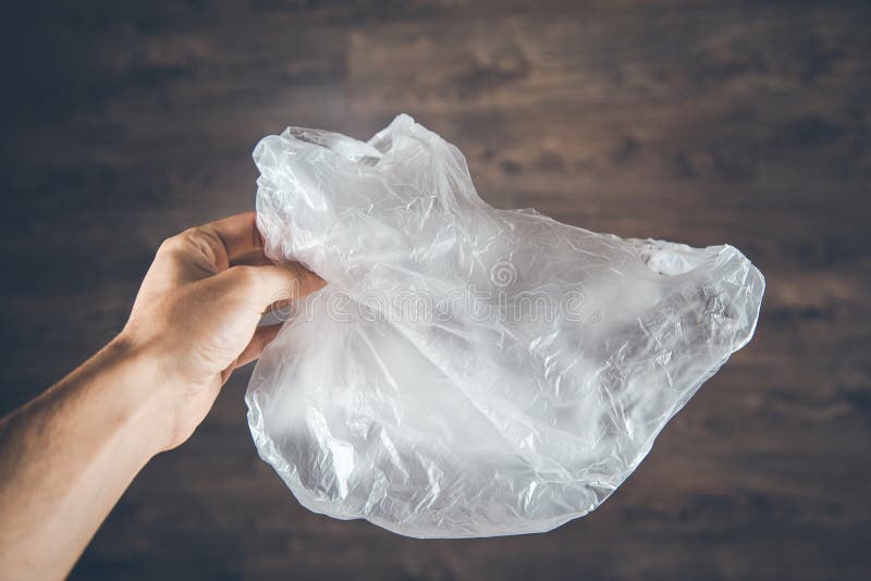 White Single Use Plastic Bag on Desk Stock Photo - Image of reusable ...