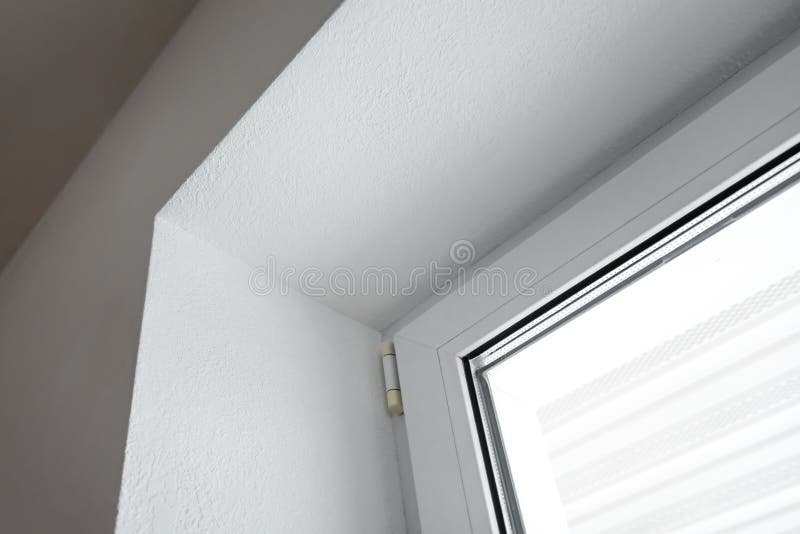 White Slope of the Window with Decorative Plaster. Stock Photo - Image ...