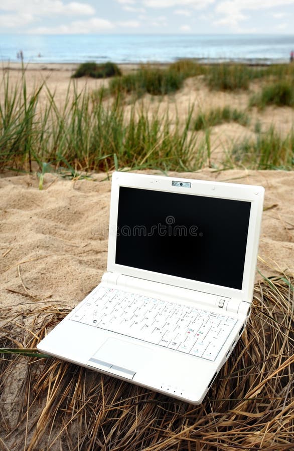 White Small Laptop on the Beach Stock Image - Image of move, future ...