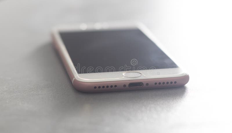 White Smart Phone with Blank Screen Lying on Table Stock Photo - Image ...