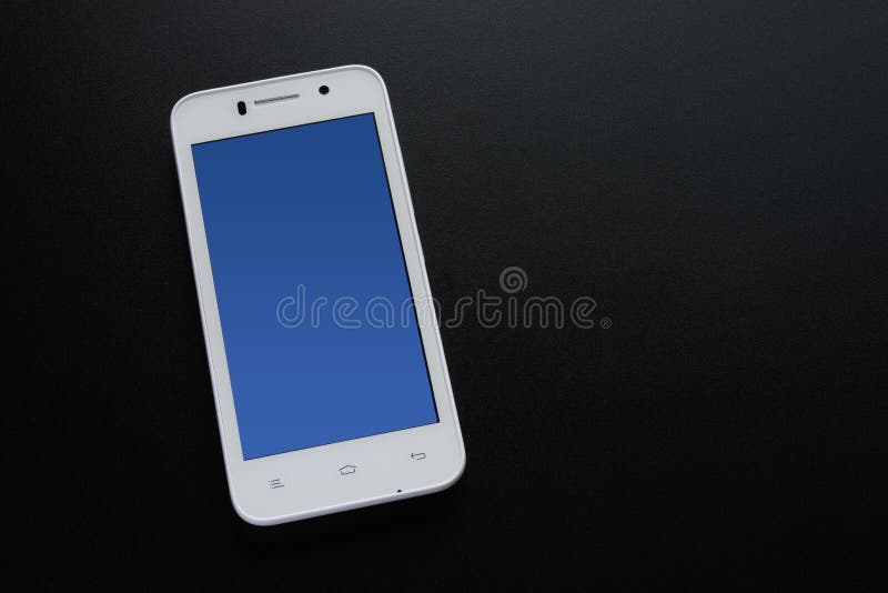 White Smart Phone with Blue Screen on the Black Table Stock Image ...