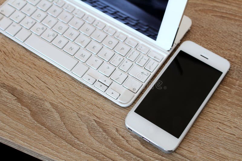 White Smartphone and White Tablet with Keyboard Stock Photo - Image of ...
