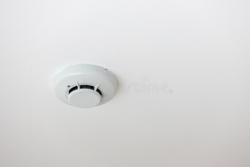 White Smoke Detector on Ceiling. Fire Smoke Sensor on Ceiling Stock ...