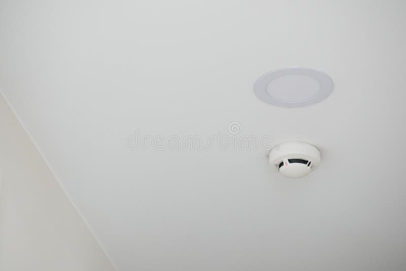 White Smoke Detector on Ceiling at Home Stock Photo - Image of grille ...