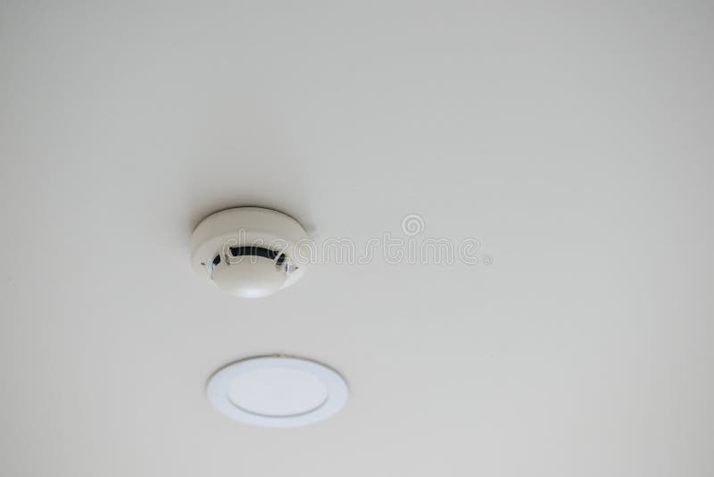 White Smoke Detector on Ceiling at Home Stock Image - Image of indoors ...