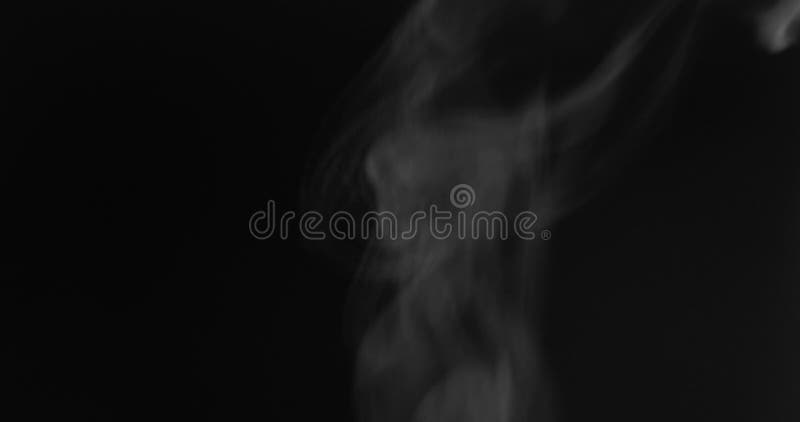 White Smoke Floating through Space Against Black Background Stock ...
