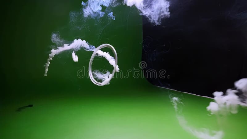 White Smoke Ring Rotating on Green Screen Background Stock Video ...
