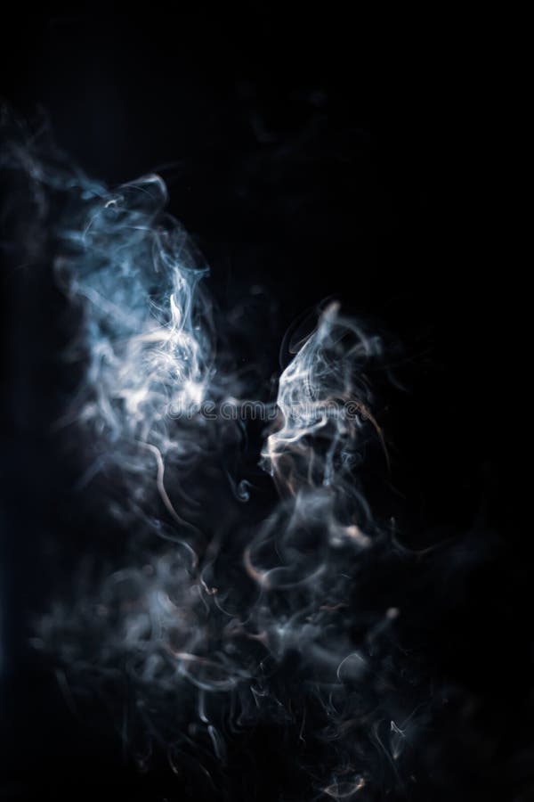 White Smoke from Incense Stick Against Dark Background Stock Photo ...