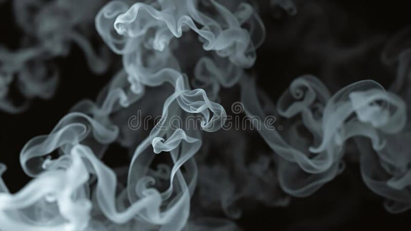 White Smoke Spread on Black Background. the Smoke Texture Looks ...