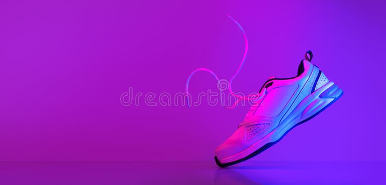 White Sneaker Hovering in Flight with Hovering Laces in Neon Lights ...