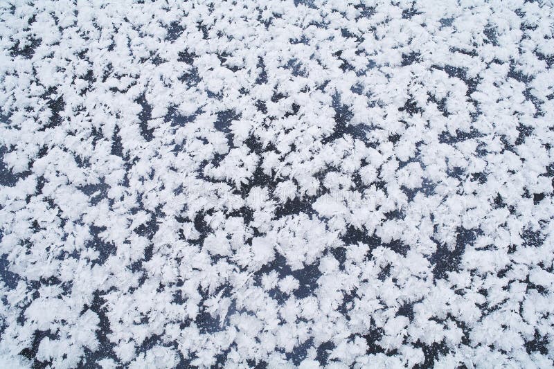 White Snowflakes on Blue Ice Stock Photo - Image of blue, cold: 84641686