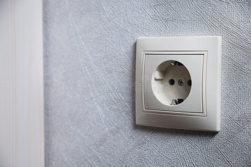 White Socket Alone on the Wall Inside the House, Close-up Stock Photo ...