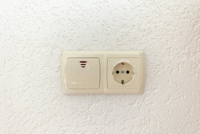 White Socket and Light Switch on Empty Wall with Place for Text Stock ...