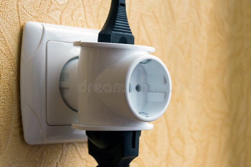 White Socket on Wall, Closeup. Power Cords Cable Plugged into European ...