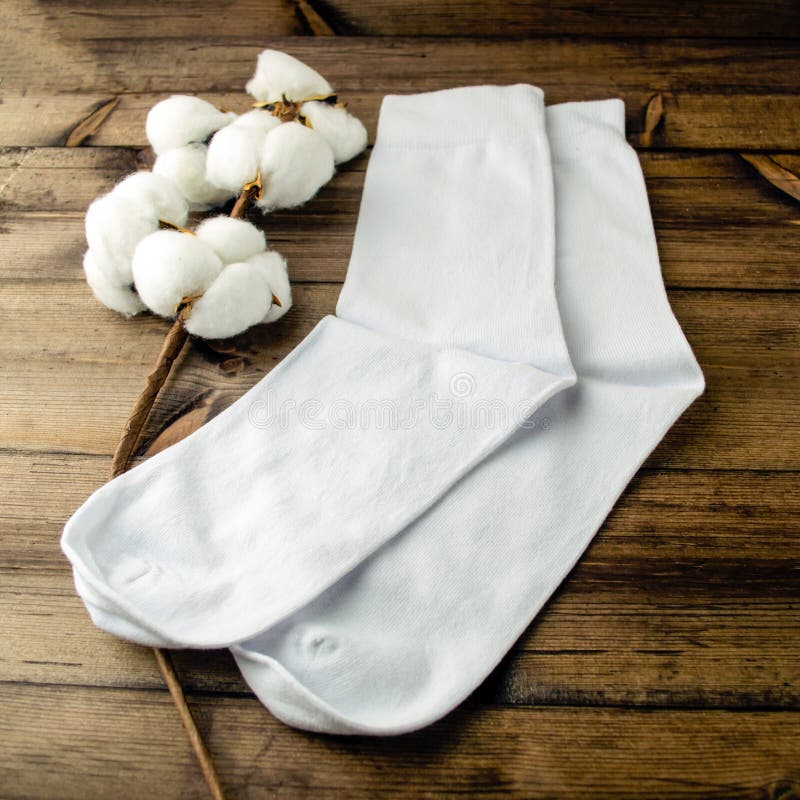 White Socks and Cotton are on the Table Stock Photo - Image of wood ...
