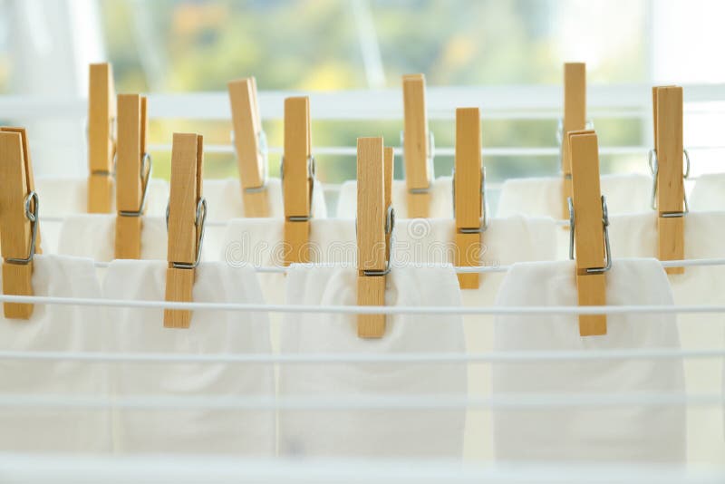 White Socks Hanging and Drying on Drying Rack Stock Photo - Image of ...