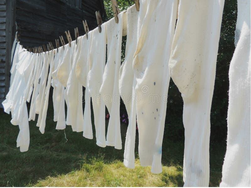 White Socks on Laundry Line Stock Photo - Image of hand, fresh: 84085558