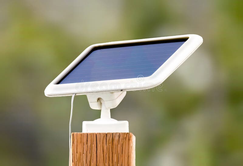 White Solar Panel that Provides Energy To a Motion Sensor Security ...