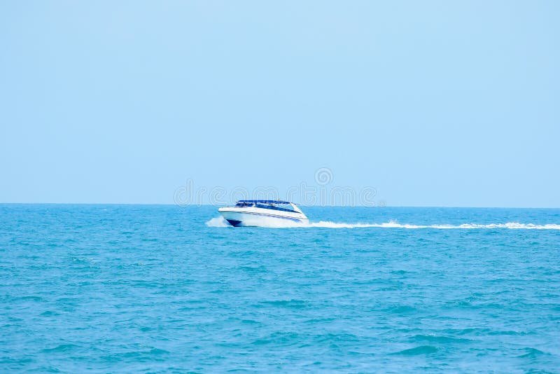 Speedboat Runs Fast in the Open Sea and Leaves the Engine`s Wake in the ...