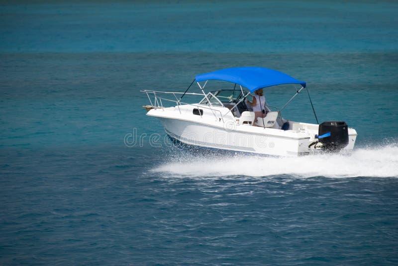 Blue and White Speedboat stock photo. Image of luxury - 5096756