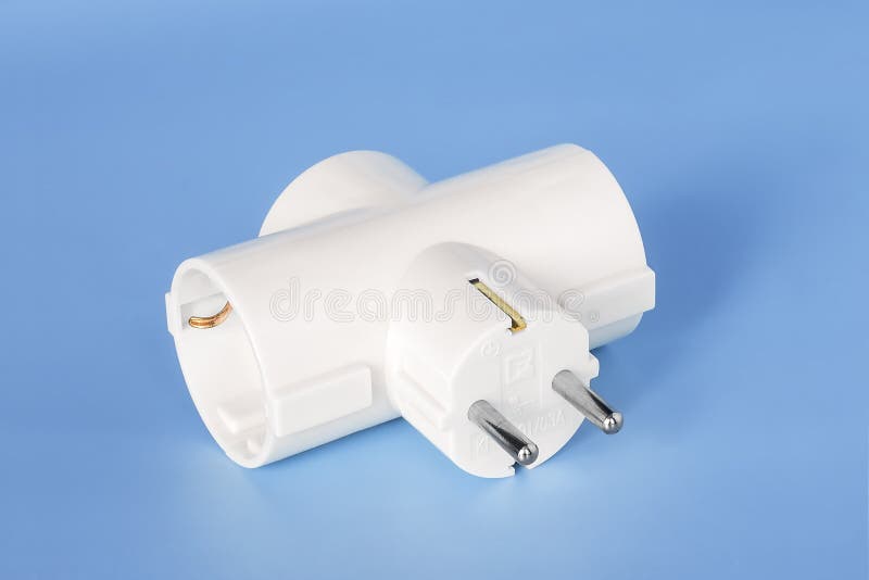 White Splitter For 220 Volt Electricity Grid On A Blue Background ...