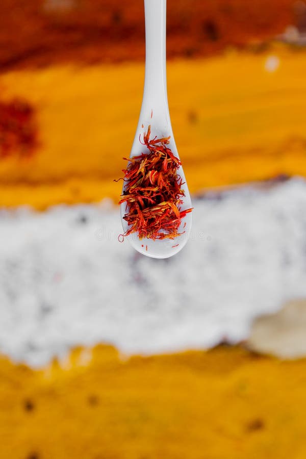 White spoon with saffron stock image. Image of paprika - 72096473