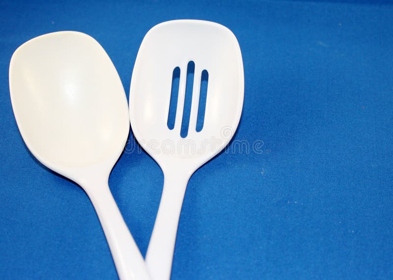 White spoons stock image. Image of kitchen, slots, white - 13460449