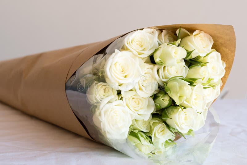 White Spray Roses in Brown Paper Stock Image - Image of floral, petals ...